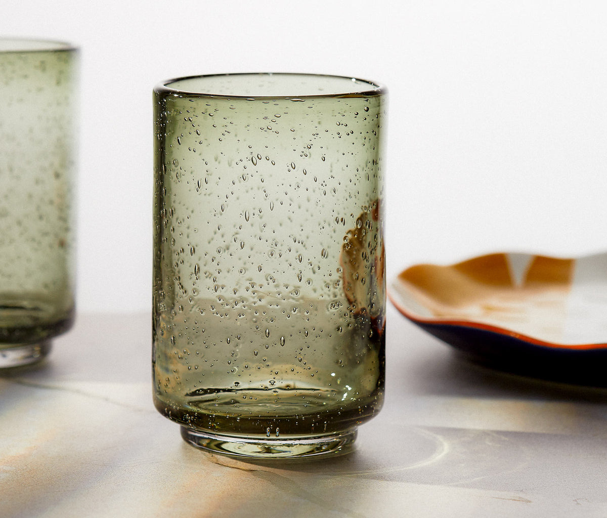 Green hand-blown tall bubble texture tumbler glasses - Lollygag